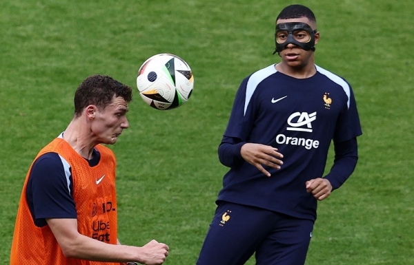 Mbappe finds face mask "horrible" as France captain plays on with ...