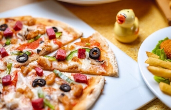 Nestle"s French unit charged over contaminated pizzas