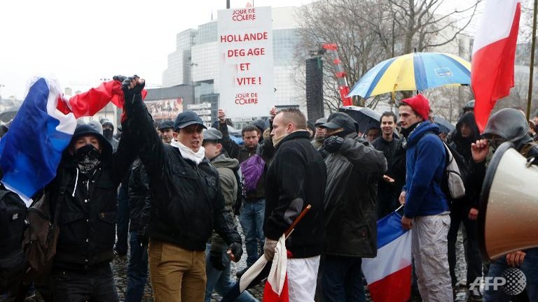 Thousands stage "Day of Anger" protest against French president