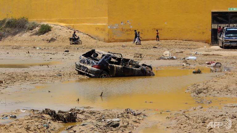 Angola storm death toll rises to 64, half of them children