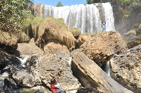 Conquering the foot of Voi Waterfall