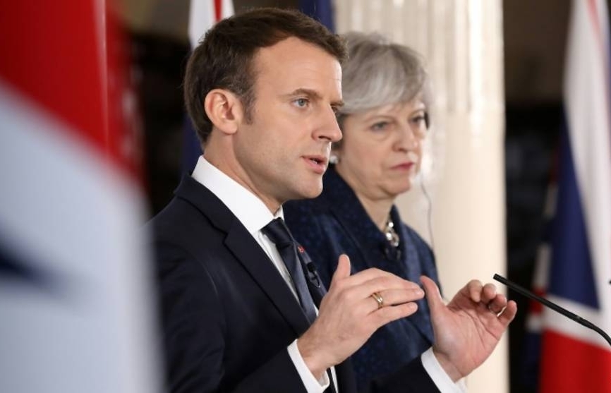 "We should never go back", Macron, May say on chemical weapons