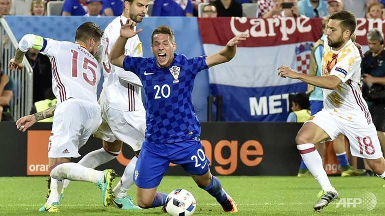 Perisic"s winner stuns champions Spain