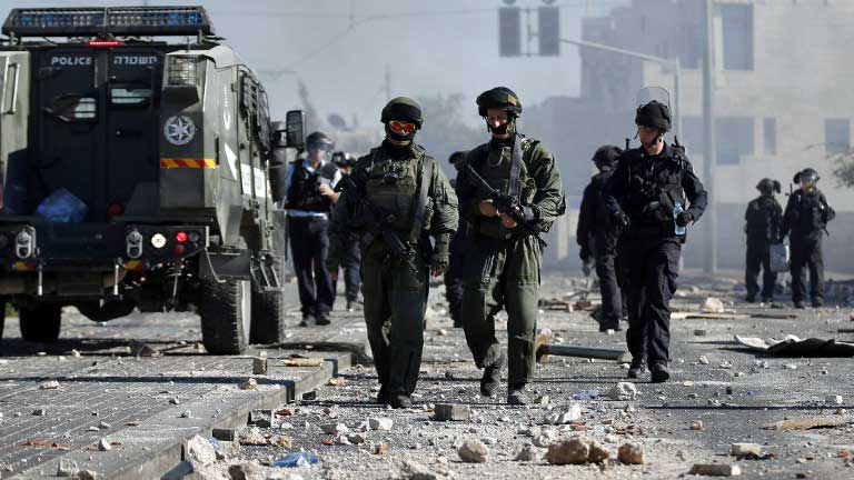 Israel, Gaza militants trade fire after teen killings